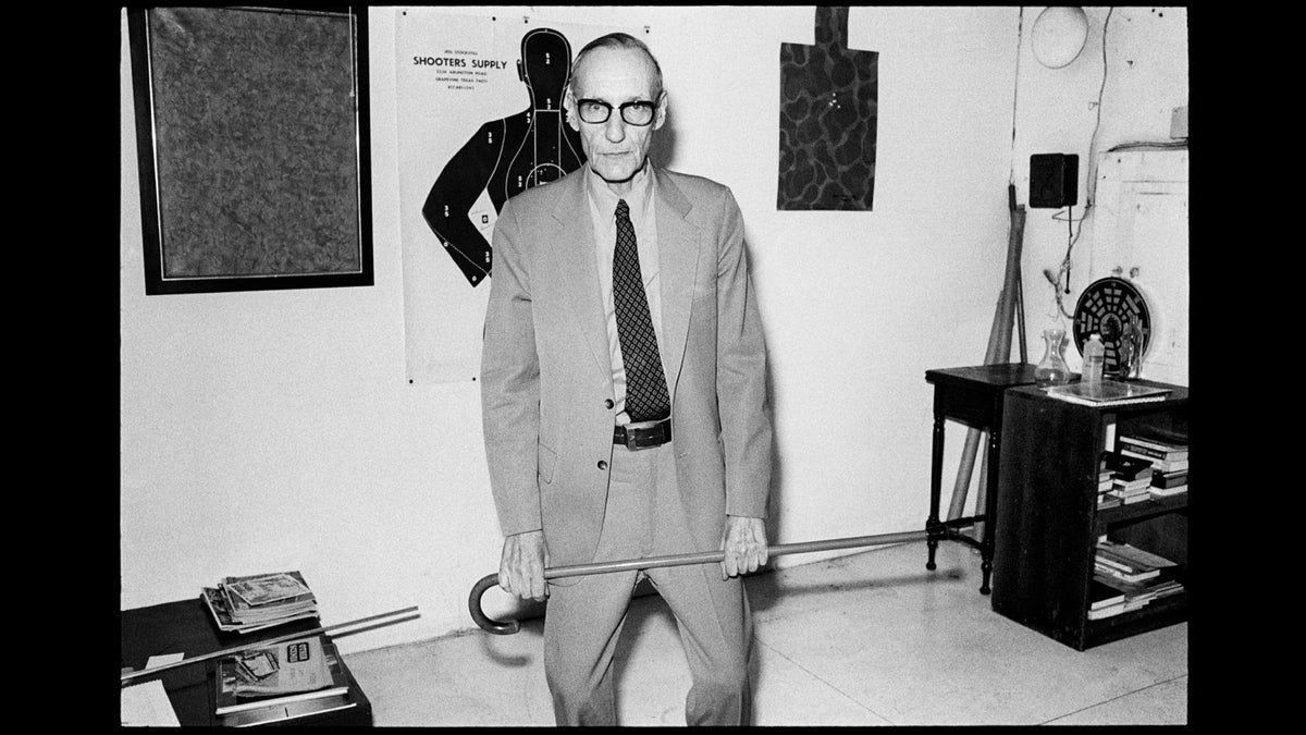 William Burroughs with cane at the Bunker – SHOWstudio